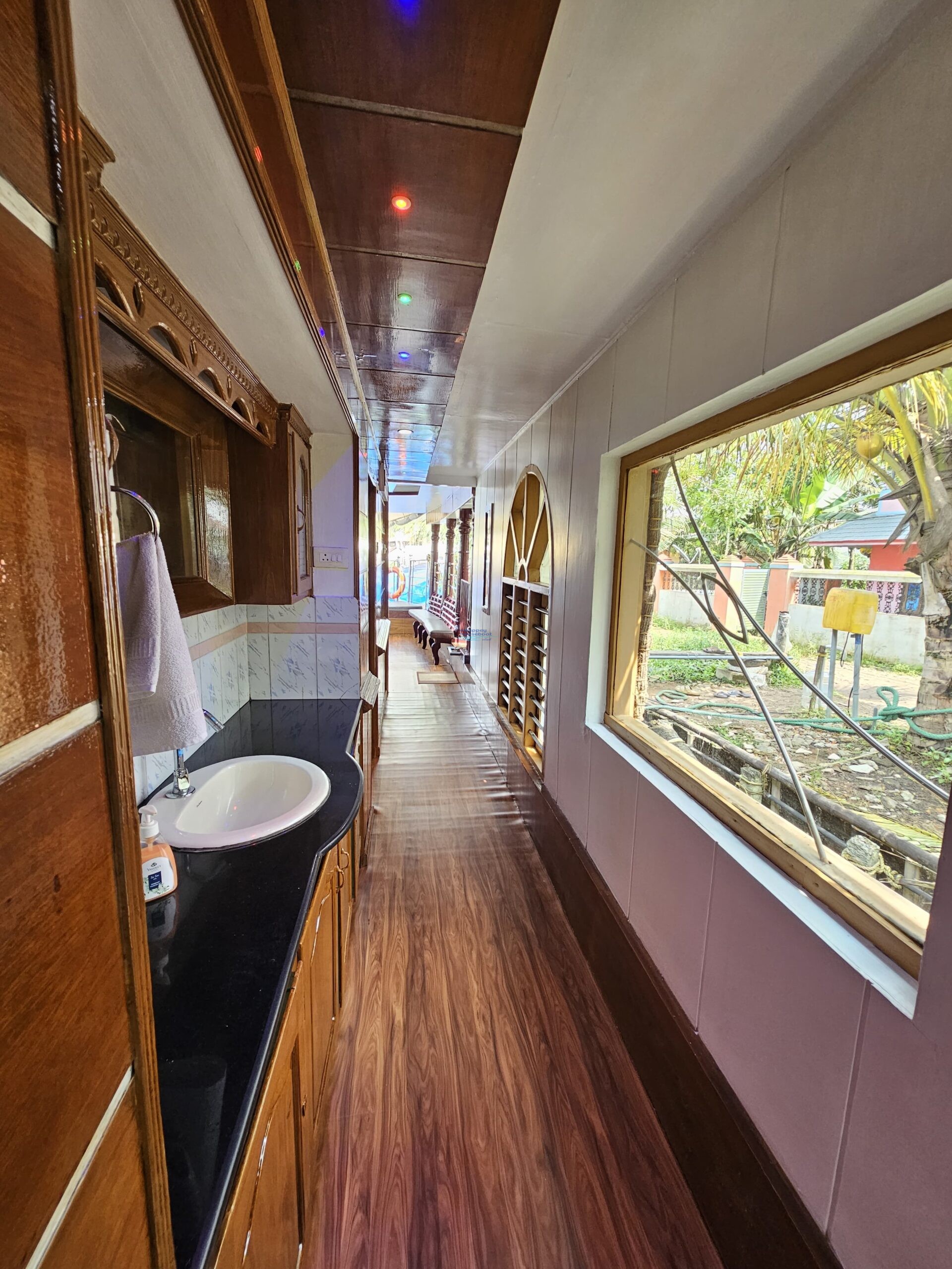 Unwind in a 3 Bedroom Deluxe Houseboat with Upper Deck in Alleppey